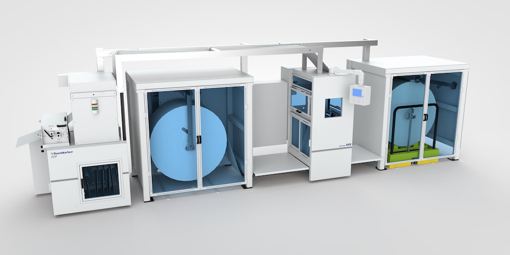 Plowfolder book solution with media changer RX8 - Hunkeler AG